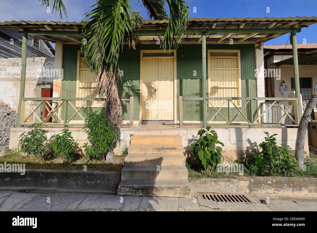 458 Vernacular wooden house of timber planks with porch on concrete ...
