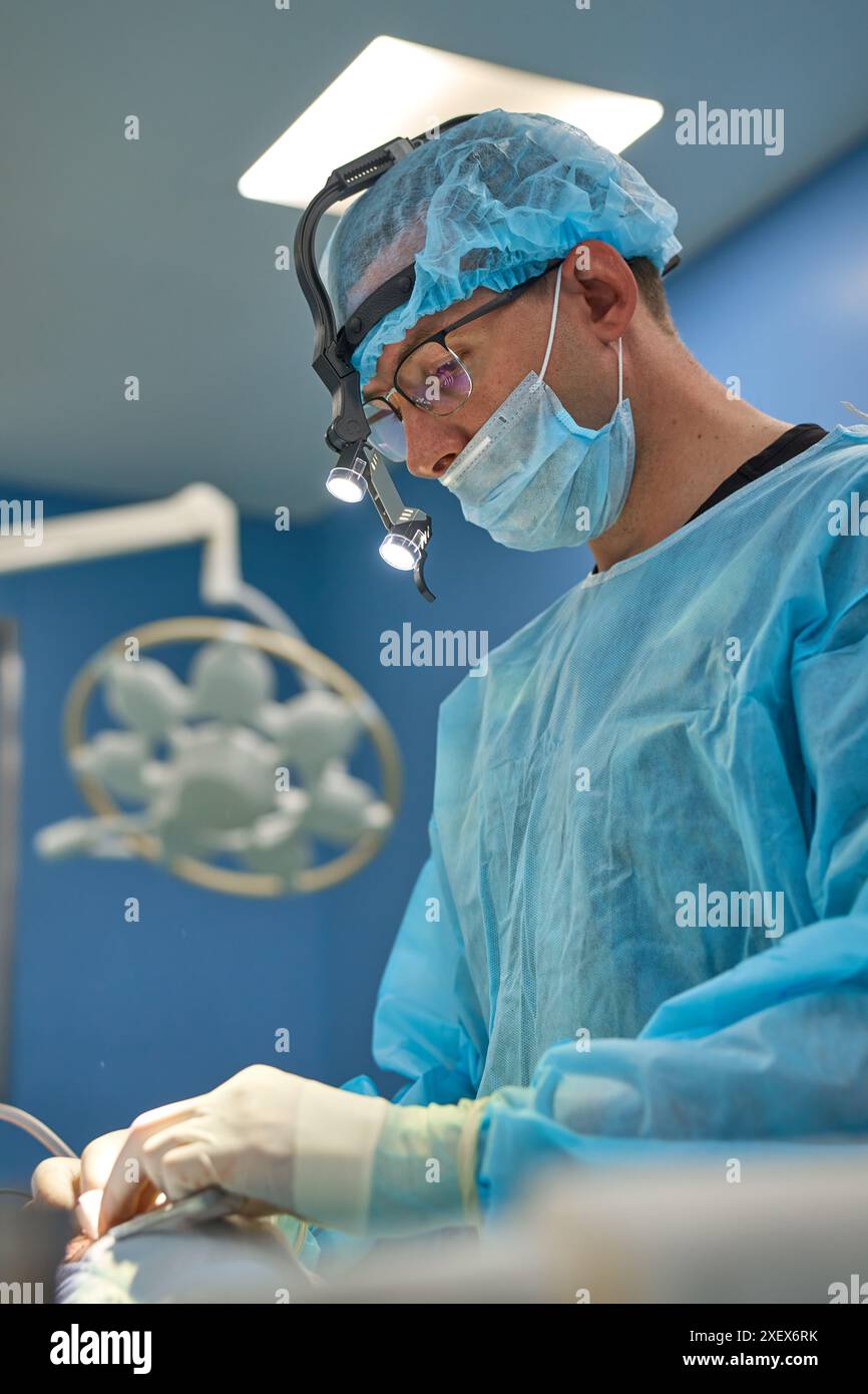 the surgeon works in the operating room Stock Photo - Alamy