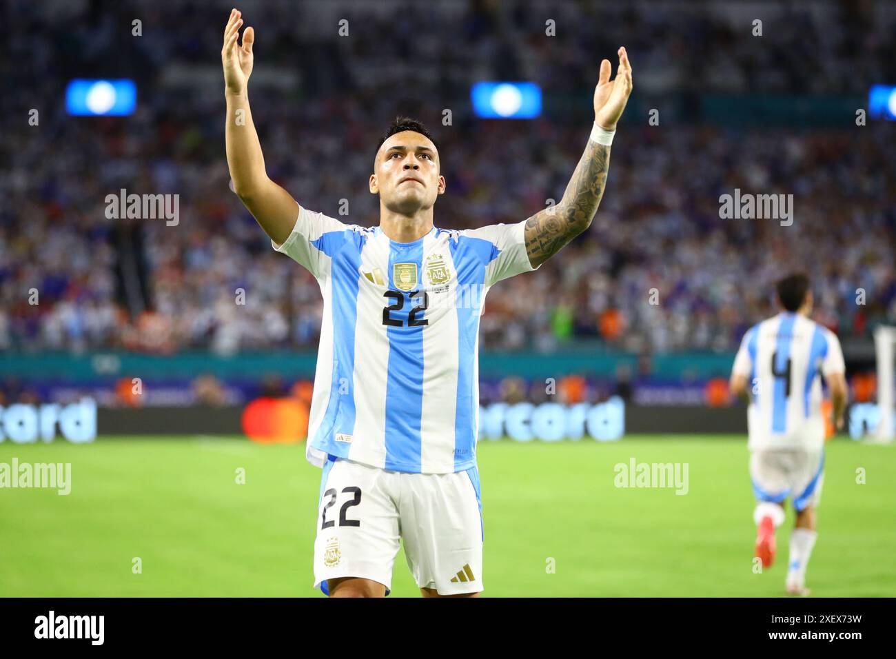 Argentina s forward Lautaro Martinez celebrates after scoring the teams ...