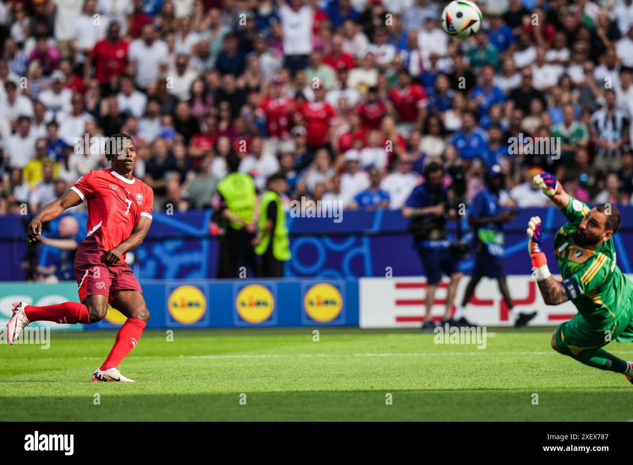 Berlin, Germany. 29th June, 2024. Breel Donald Embolo (L) of ...