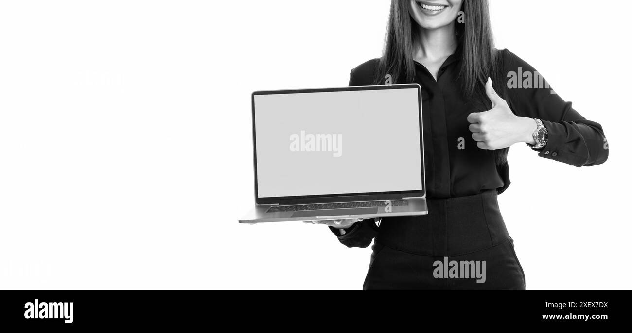 Businesswoman crop view holding open laptop with green screen mockup ...