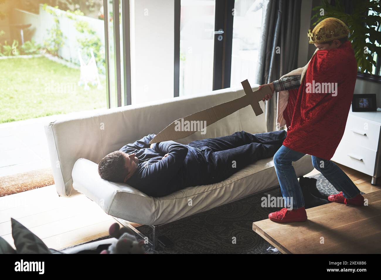 Father, son and playing with sword in costume for cosplay, halloween or ...
