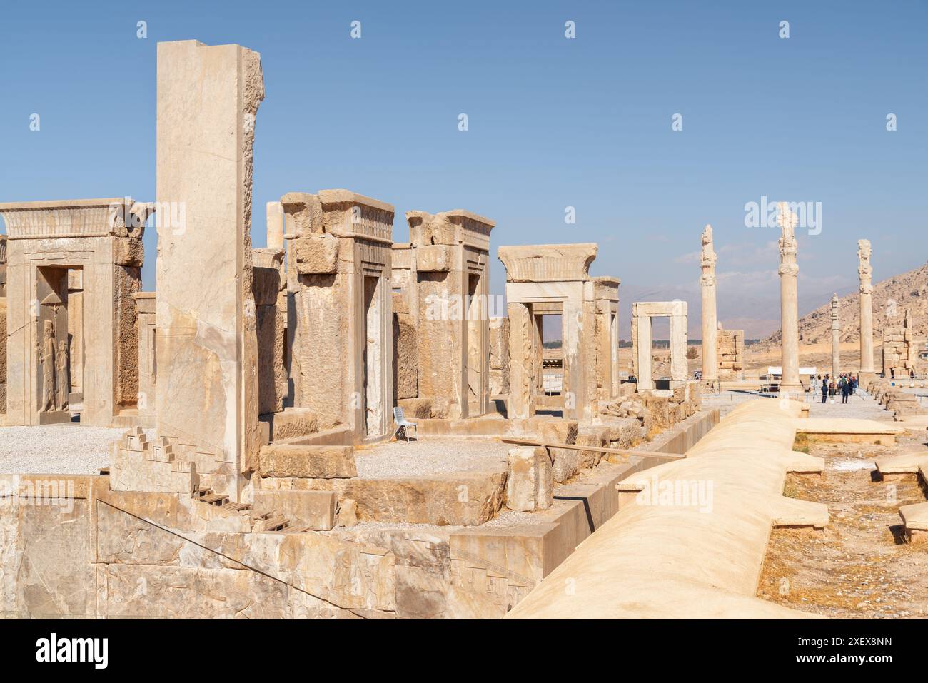 Ruins of the Tachara Palace and columns of the Apadana Palace on blue ...