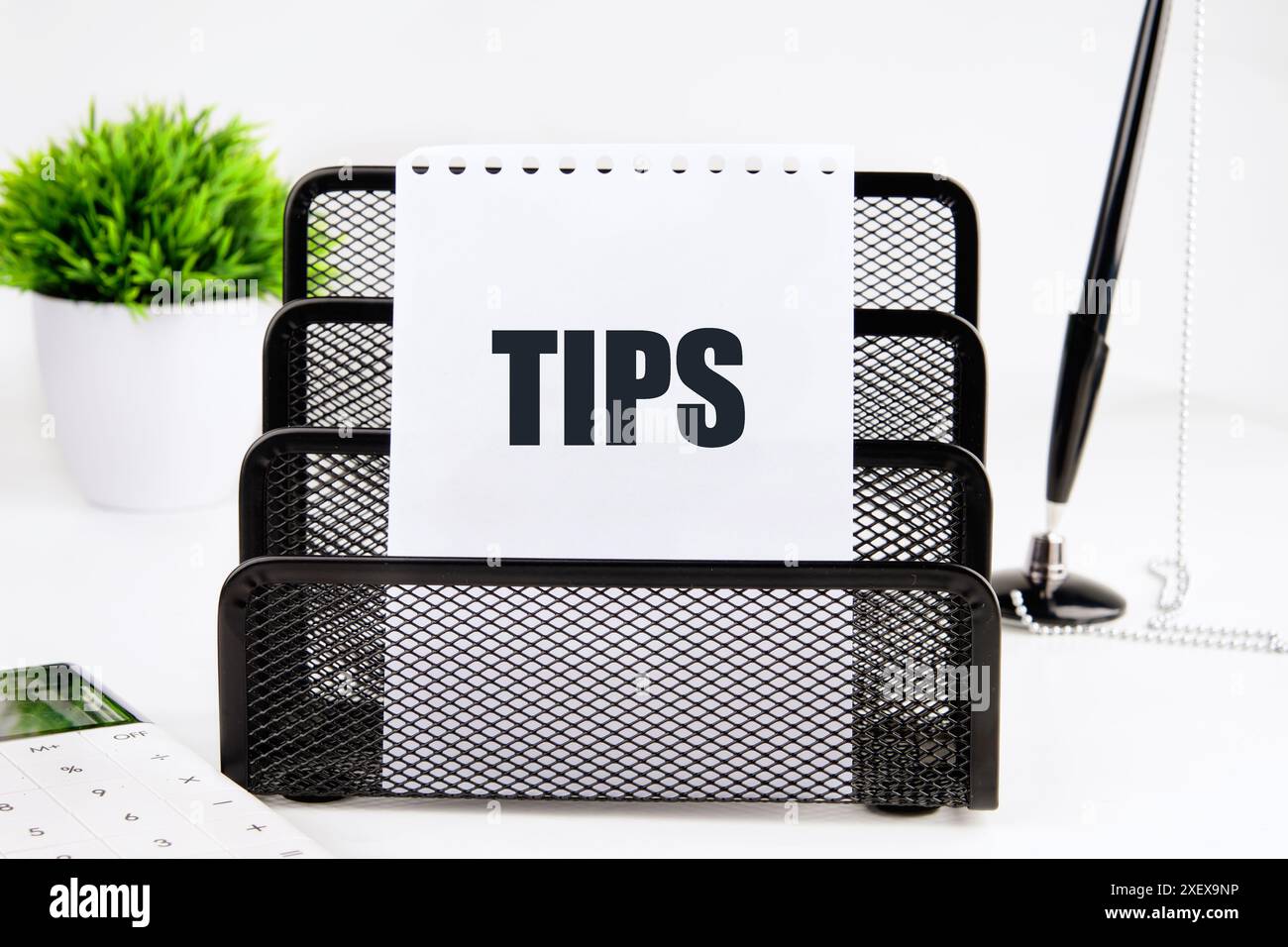 TIPS written on a piece of paper on a white background Stock Photo - Alamy