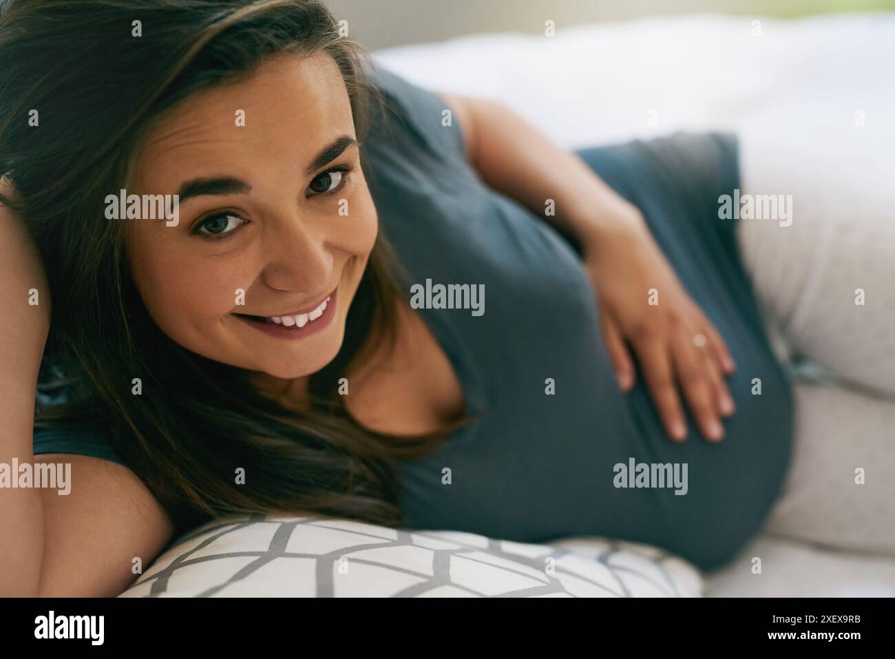 Portrait, smile and pregnant woman in home for relax, maternity or ...