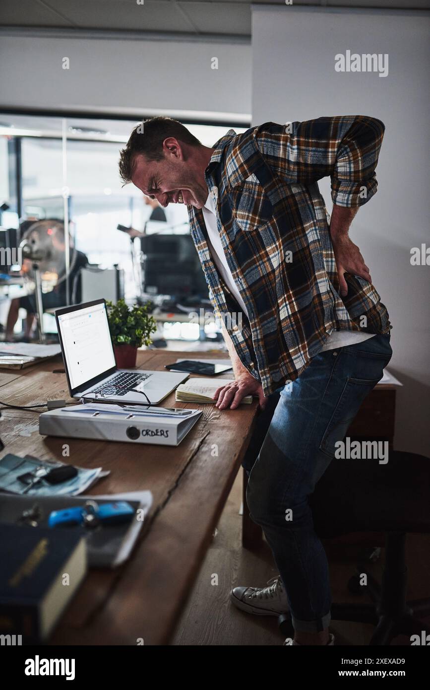 Business, man and back pain in office, muscle tension and creative ...