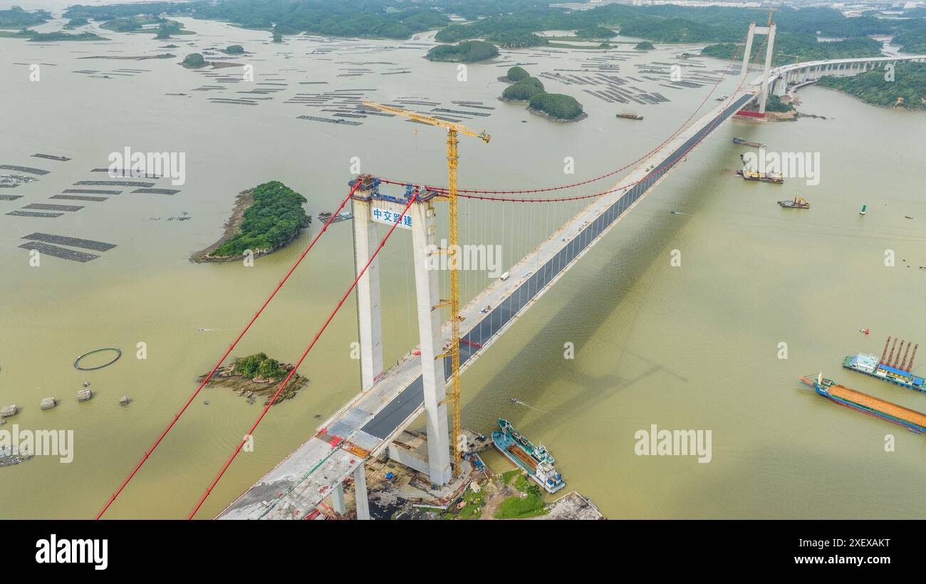 Fangchenggang, China. 30th June, 2024. Longmen Bridge, the longest ...