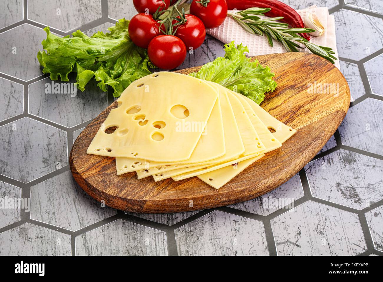 Tasty Masdam cheese slices for snack Stock Photo - Alamy