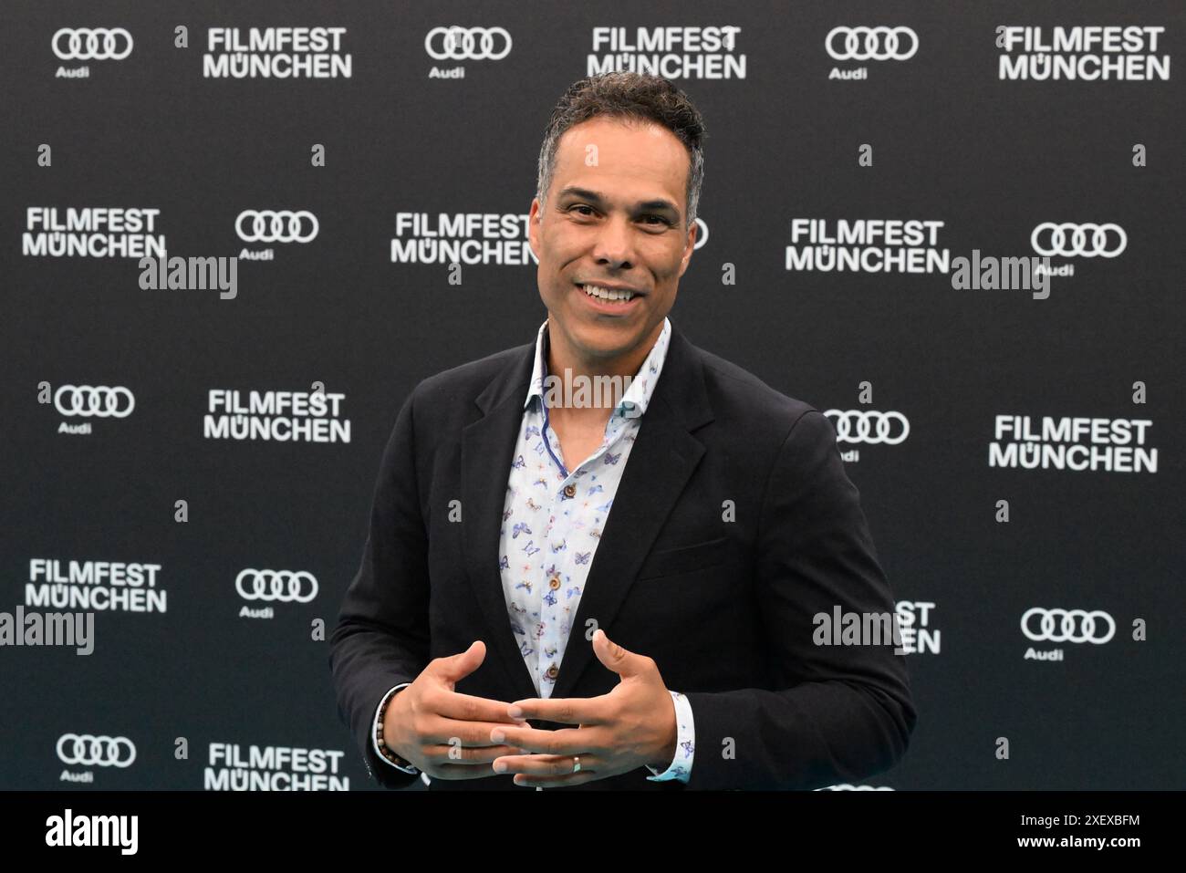 Munich, Germany. 29th June, 2024. Actor Patrick Dewayne walks the carpet at the opening gala ...