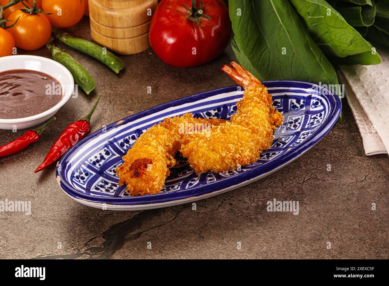 Crispy breaded golden fried prawns with sauce Stock Photo - Alamy