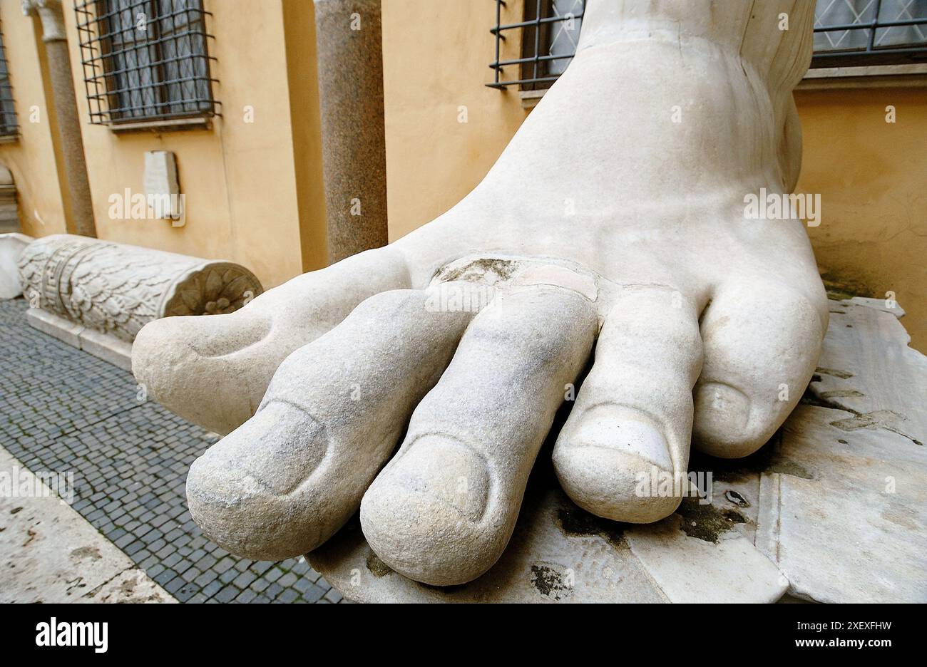 Foot of statue of Emperor Constantine II at courtyard of Palazzo dei ...