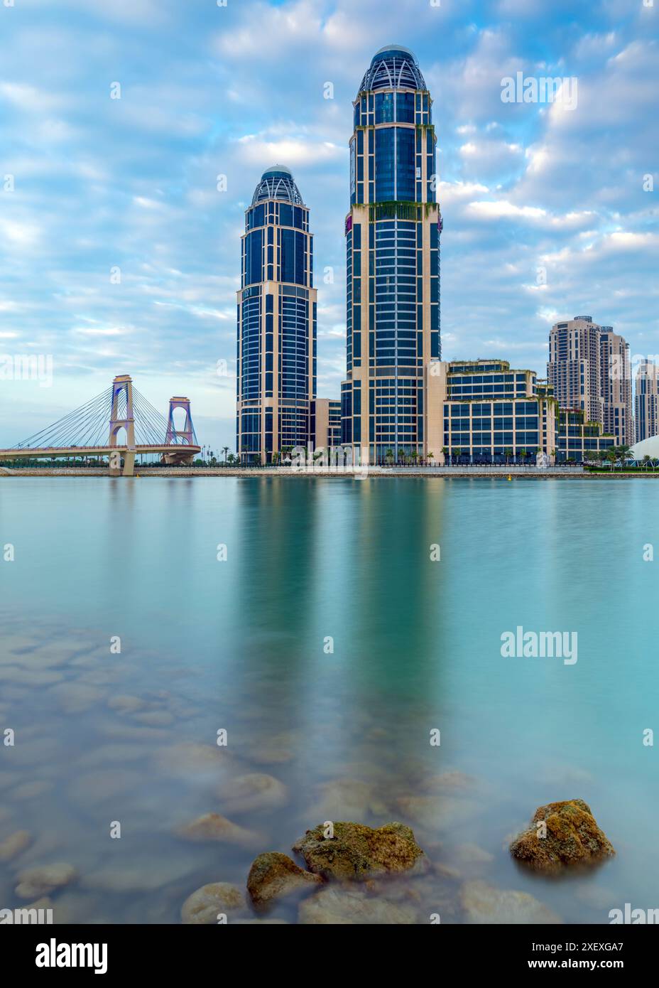 UDC twin tower Pearl Qatar view with gewan bridge Stock Photo - Alamy