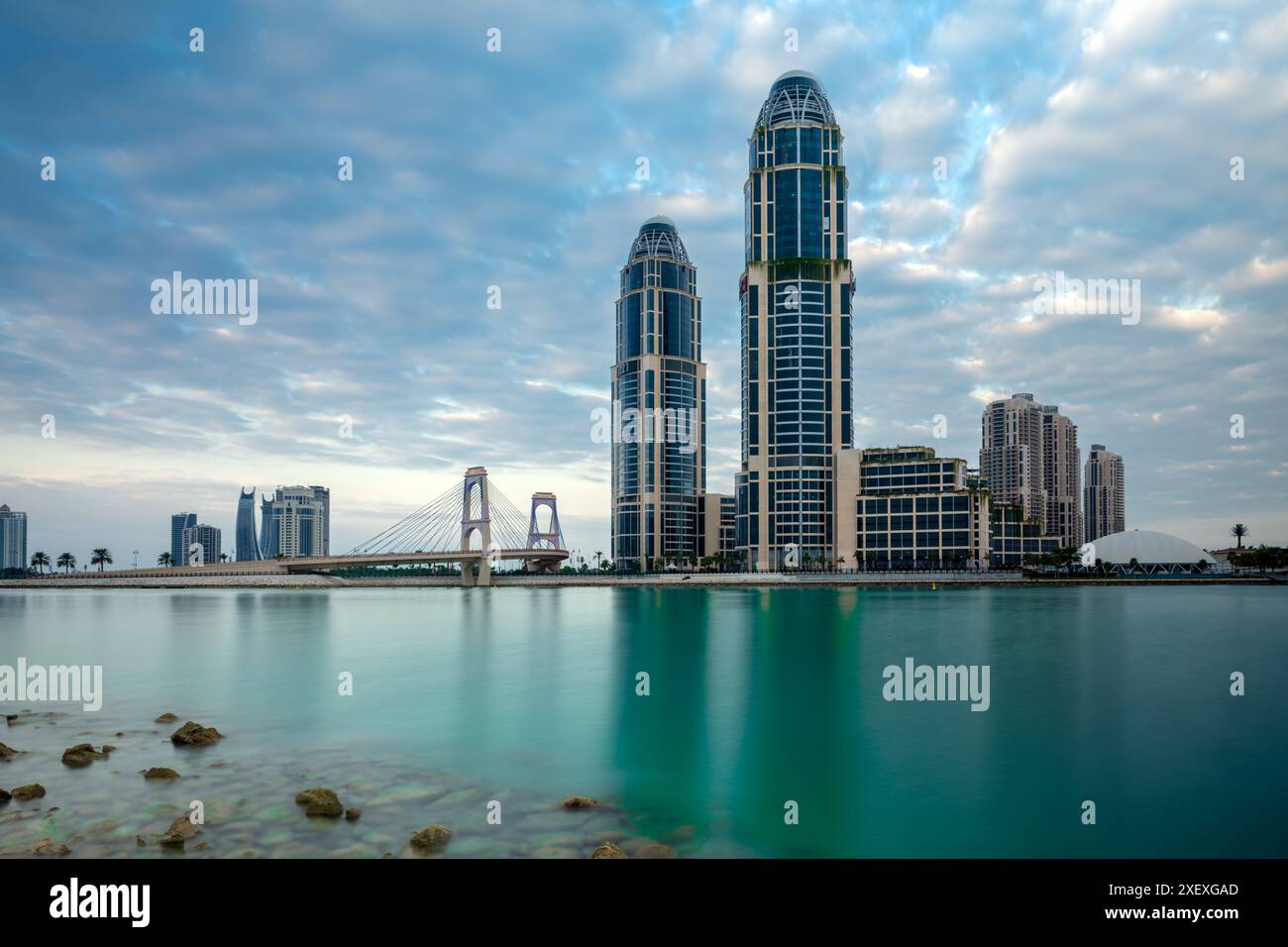UDC twin tower Pearl Qatar view with gewan bridge Stock Photo - Alamy