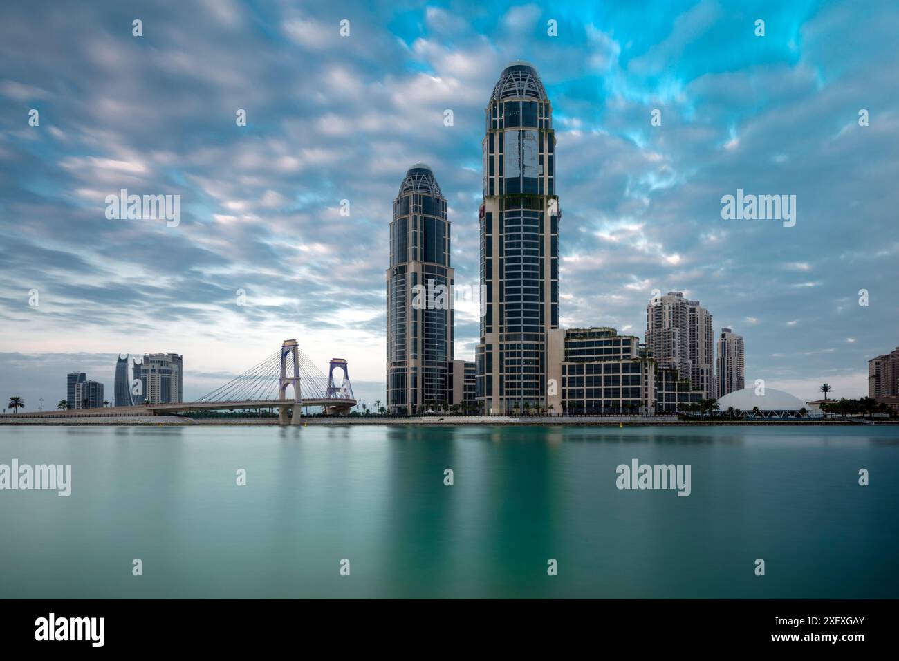 UDC twin tower Pearl Qatar view with gewan bridge Stock Photo - Alamy