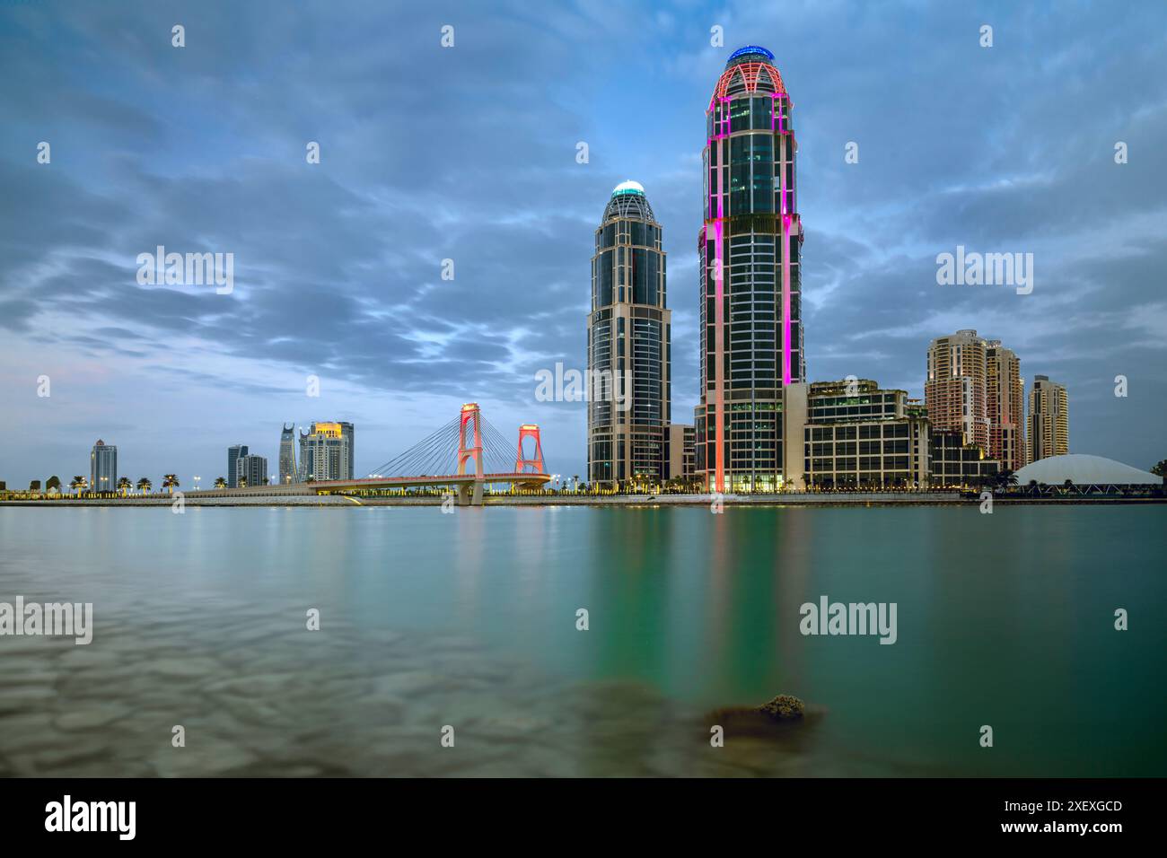 UDC twin tower Pearl Qatar view with gewan bridge Stock Photo - Alamy
