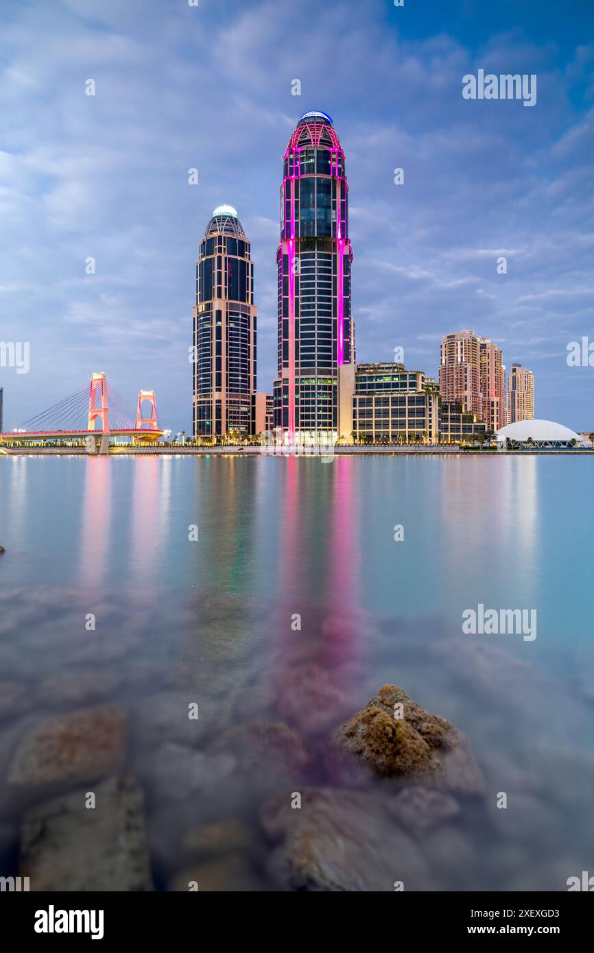 UDC twin tower Pearl Qatar view with gewan bridge Stock Photo - Alamy