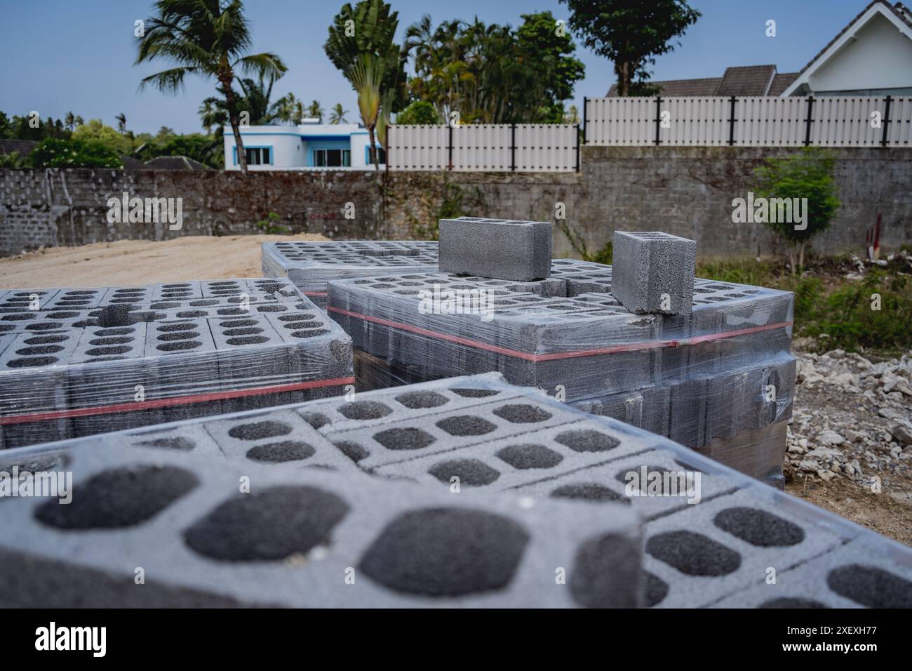 Concrete blocks with holes stacked on top of each other Stock Photo - Alamy