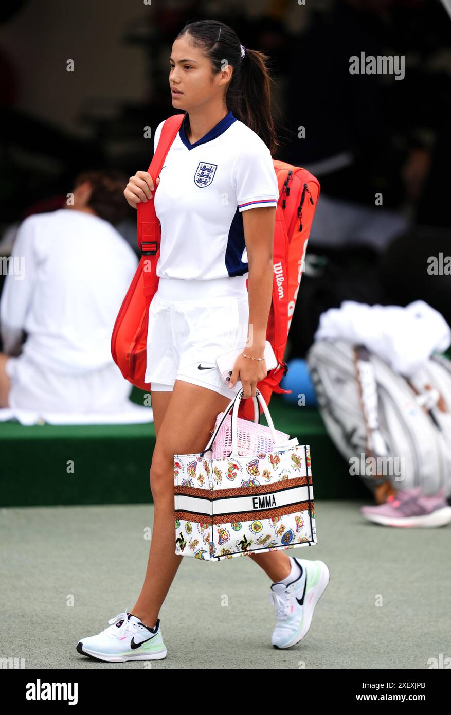 Emma Raducanu arrives ahead of practice in an England football strip at ...