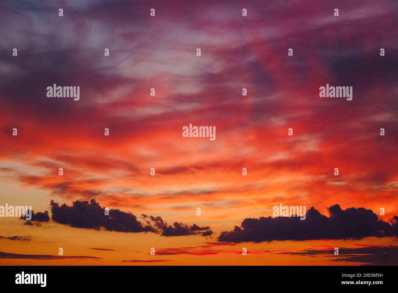 changing weather forecast. red clouds on the evening sky. dramatic ...
