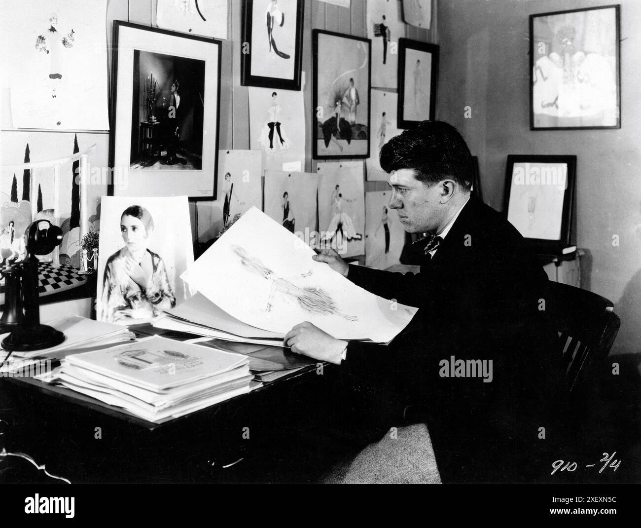 Costume designer TRAVIS BANTON with sketches for costumes designed by ...