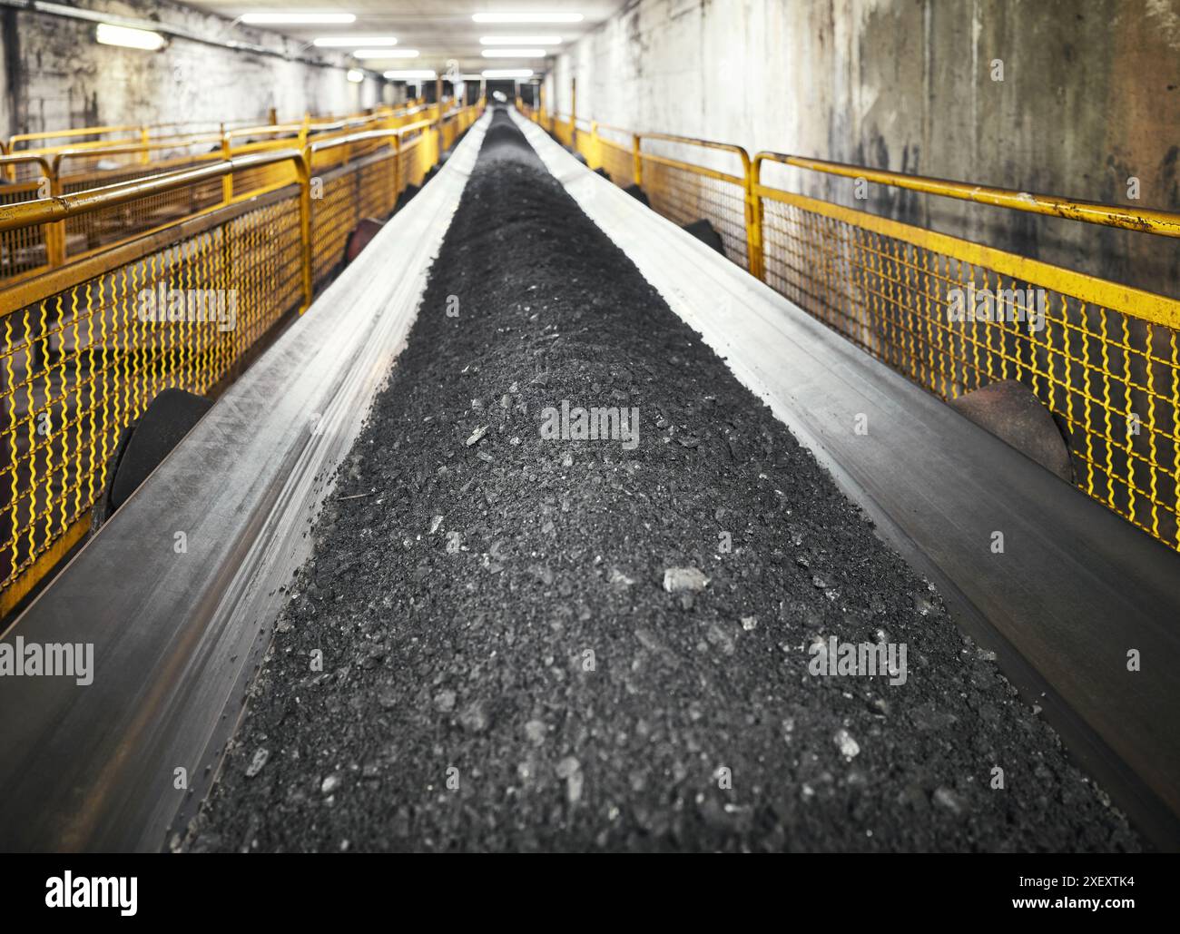 Belt conveyor transporting fine coal in a heating plant, selective mid ...