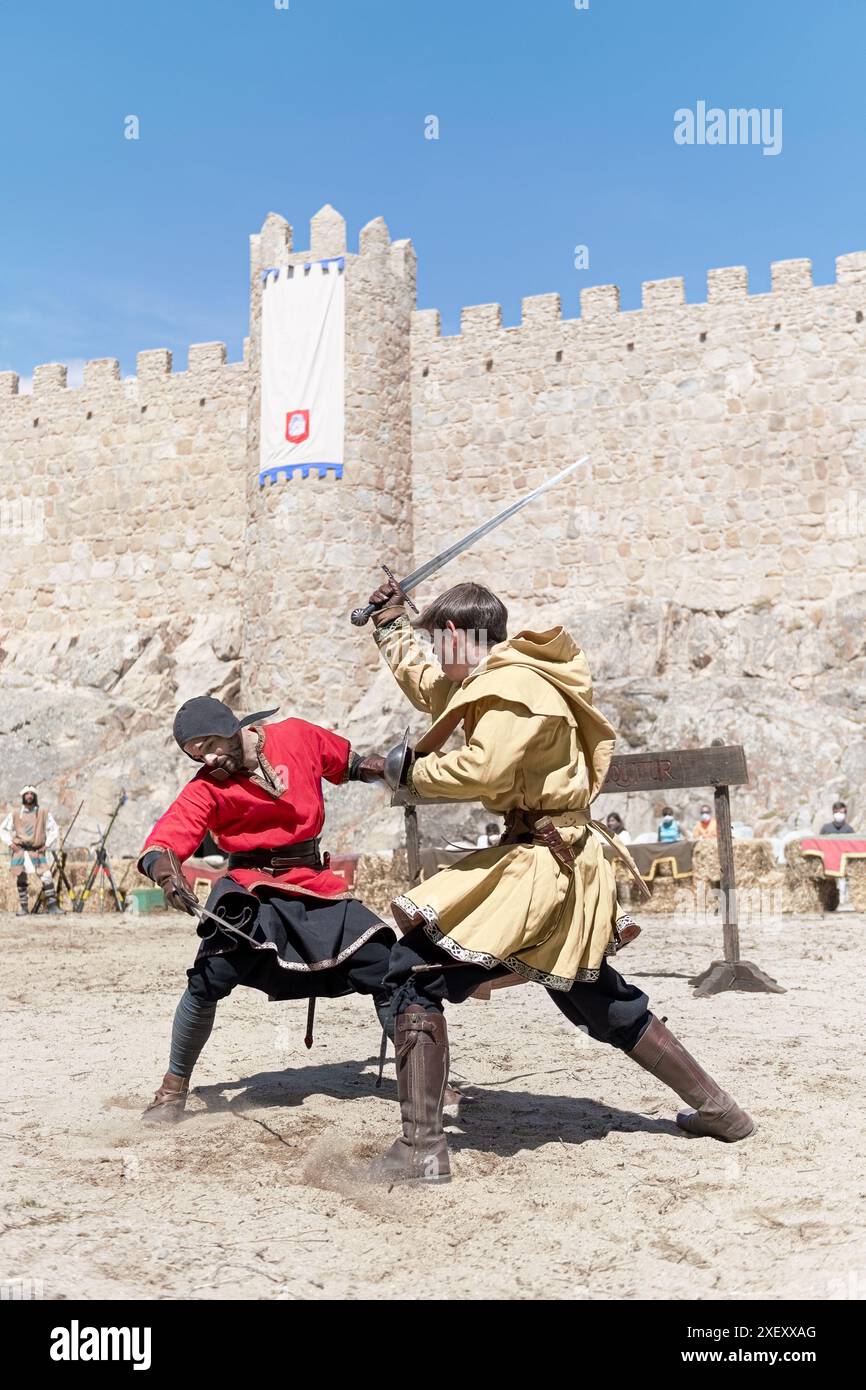 medieval actor in the foreground, staging the medieval era, with the ...