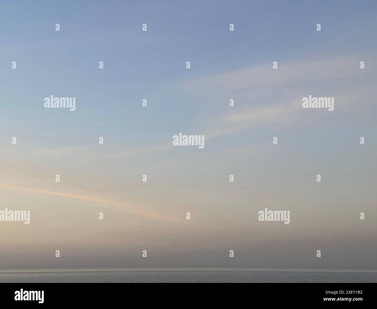 Low contrast background. Pastel color sky with cloud and sea Stock ...
