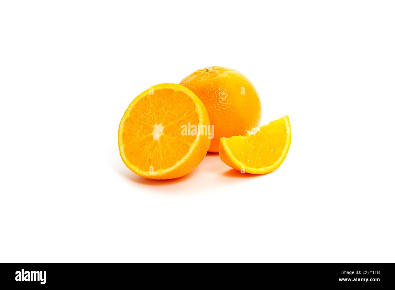 orange cut into sections isolated on white background Stock Photo - Alamy