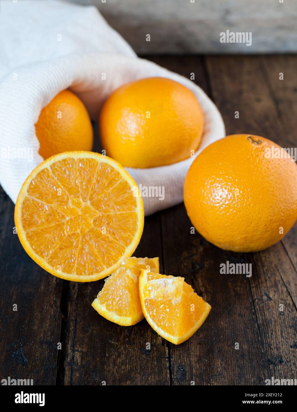 Oranges isolated cut set on wooden base Stock Photo - Alamy