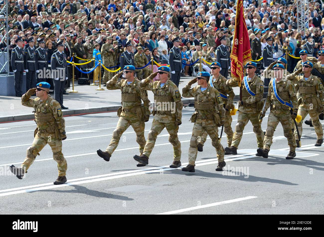 Ukrainian military men paratroopers, officers flying national flag ...