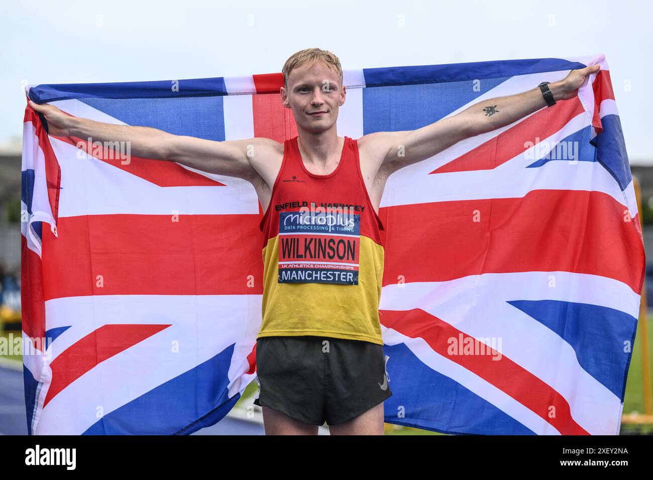 Callum Wilkinson celebrates winning the 10000m with a new national ...