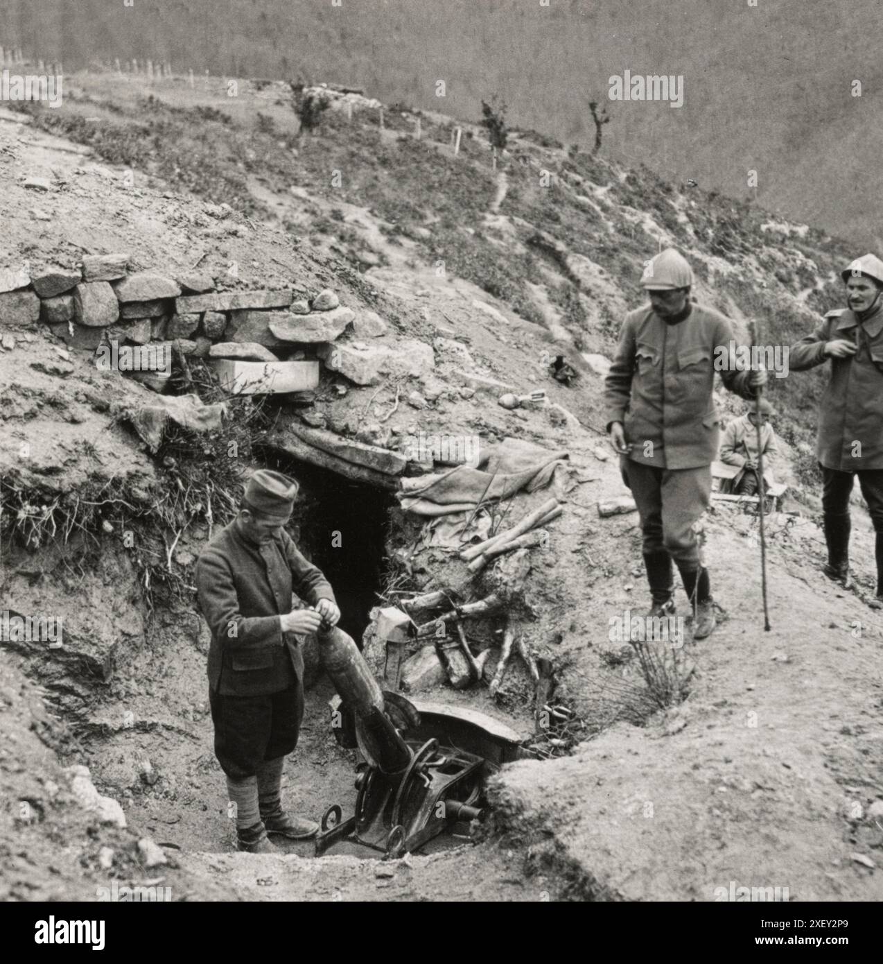 Vintage photo of World War I. 1914-1918. Loading a trench mortar in a ...
