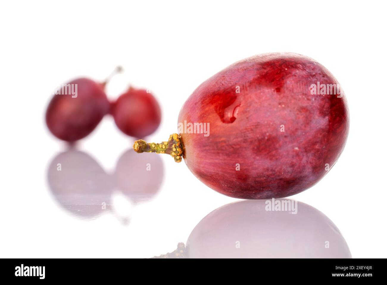 Three grapes, macro, isolated on white background Stock Photo - Alamy