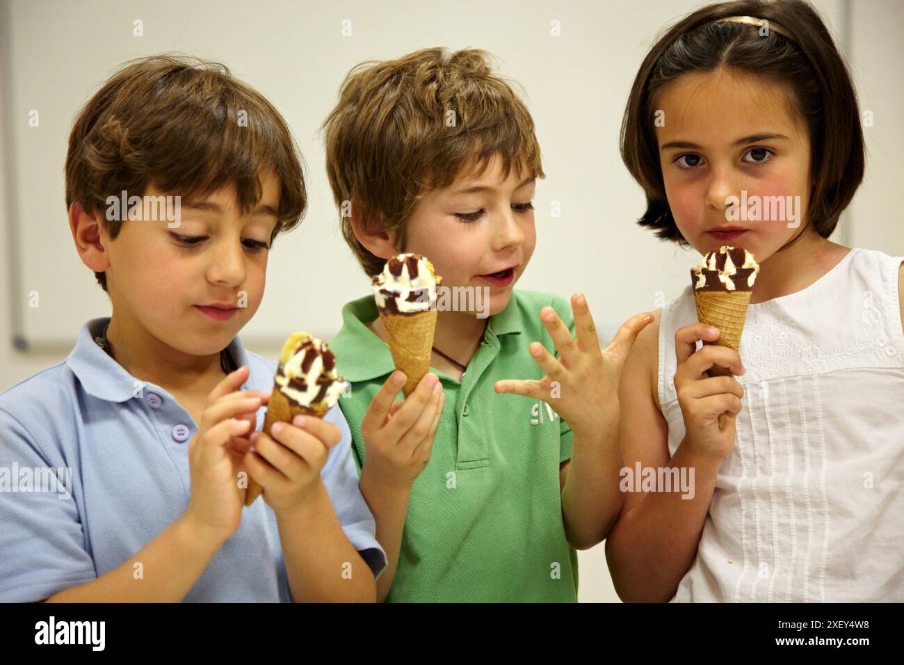 Children eating ice-cream cones, tasting session in sensory lab, AZTI ...