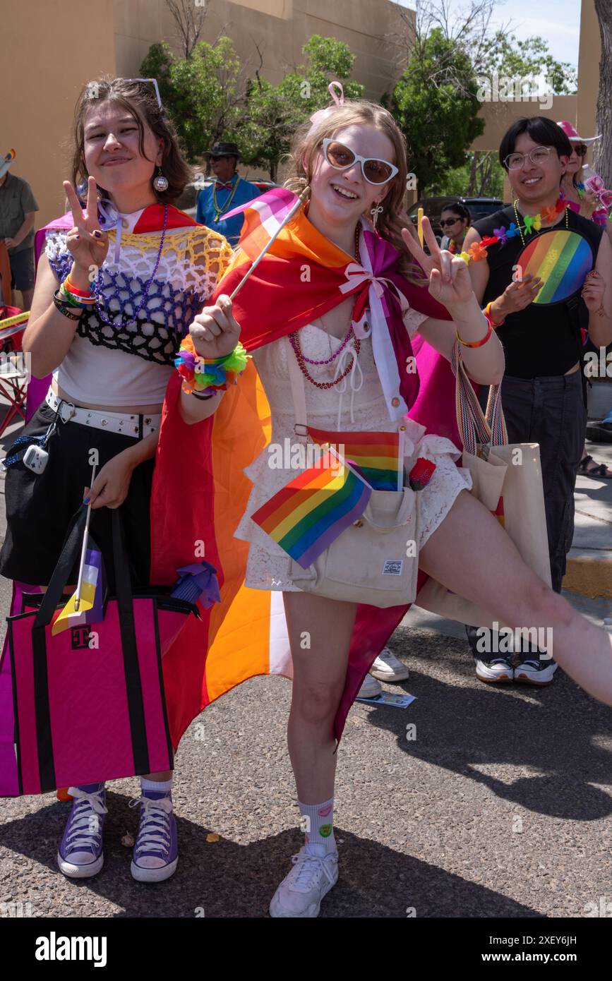 Two young women in costume smile for the camera at the Albuquerque ...