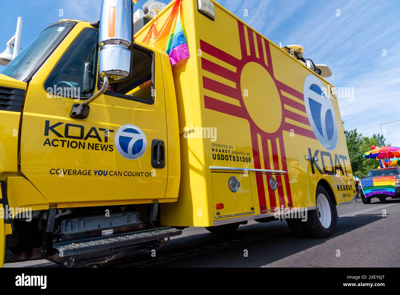 Bright yellow news truck with red zip on the side for KOAT Action News ...