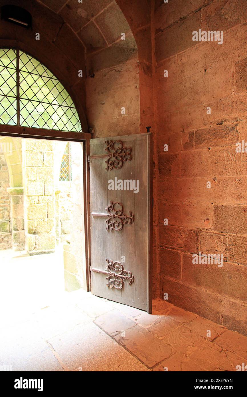 Wooden door of one of the entrance at the Mont Saint-Michel Abbey in ...