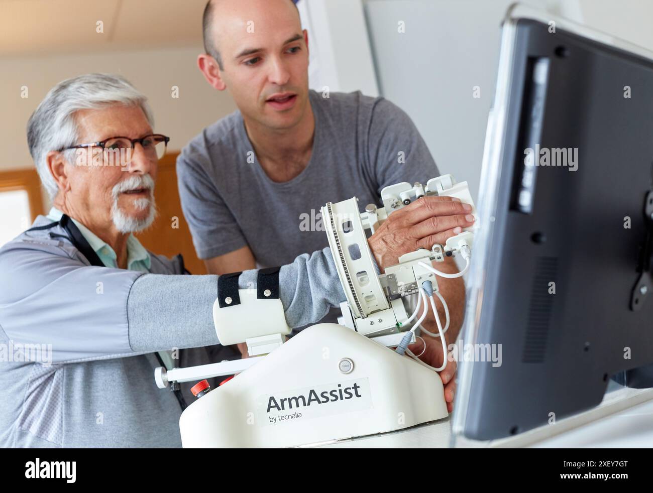 Patient with assistive robot for upper limb rehabilitation, The robot ... Patient with assistive robot for upper limb rehabilitation, The robot ...