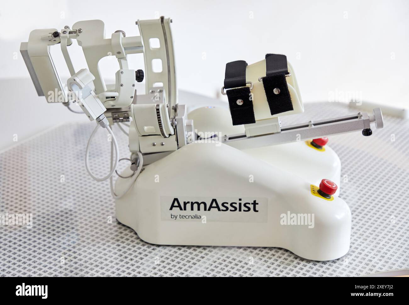 Patient with assistive robot for upper limb rehabilitation, The robot ...