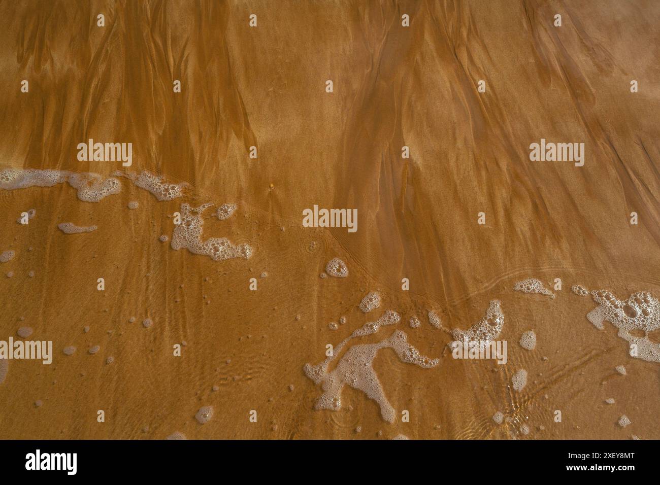 Sand texture on the ocean beach Stock Photo - Alamy