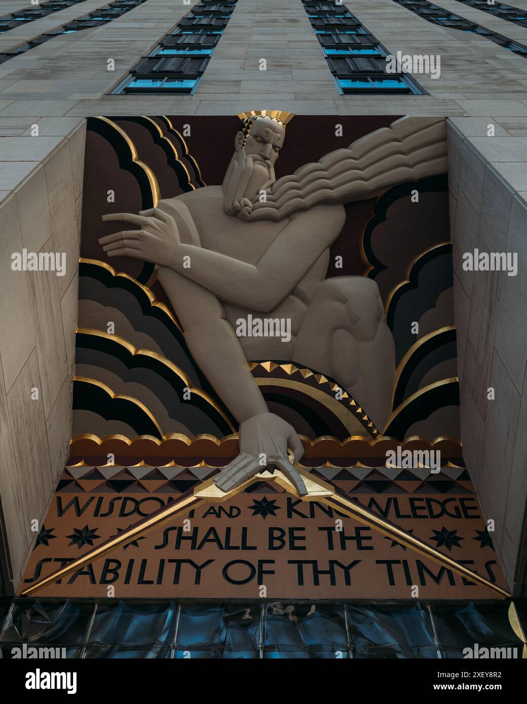 Art Deco sculpture on building facade in New York City featuring wisdom ...