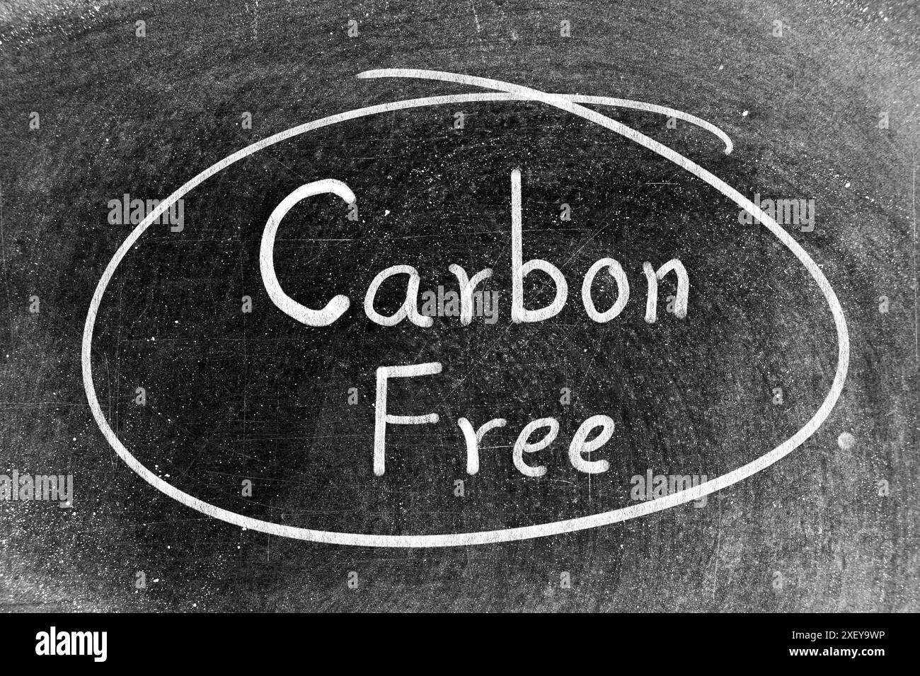 White chalk hand writing in word carbon free and circle shape on ...