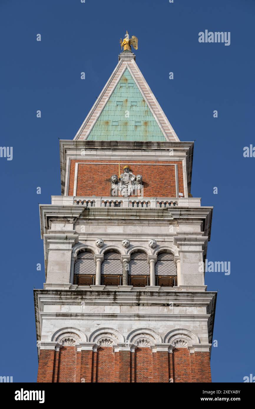Venice, Italy - March 20, 2024 - Belfry and spire of St. Mark's Campanile bell tower of Saint ...