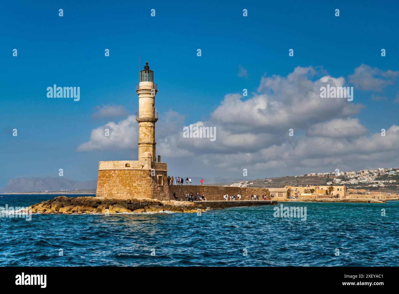 Lighthouse at port, Old Venetian Harbor, from promenade in Hania ...