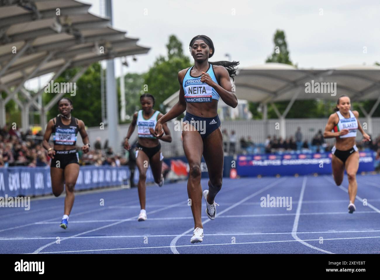 Daryll Neita wins the third heat of the women’s 200m during the ...