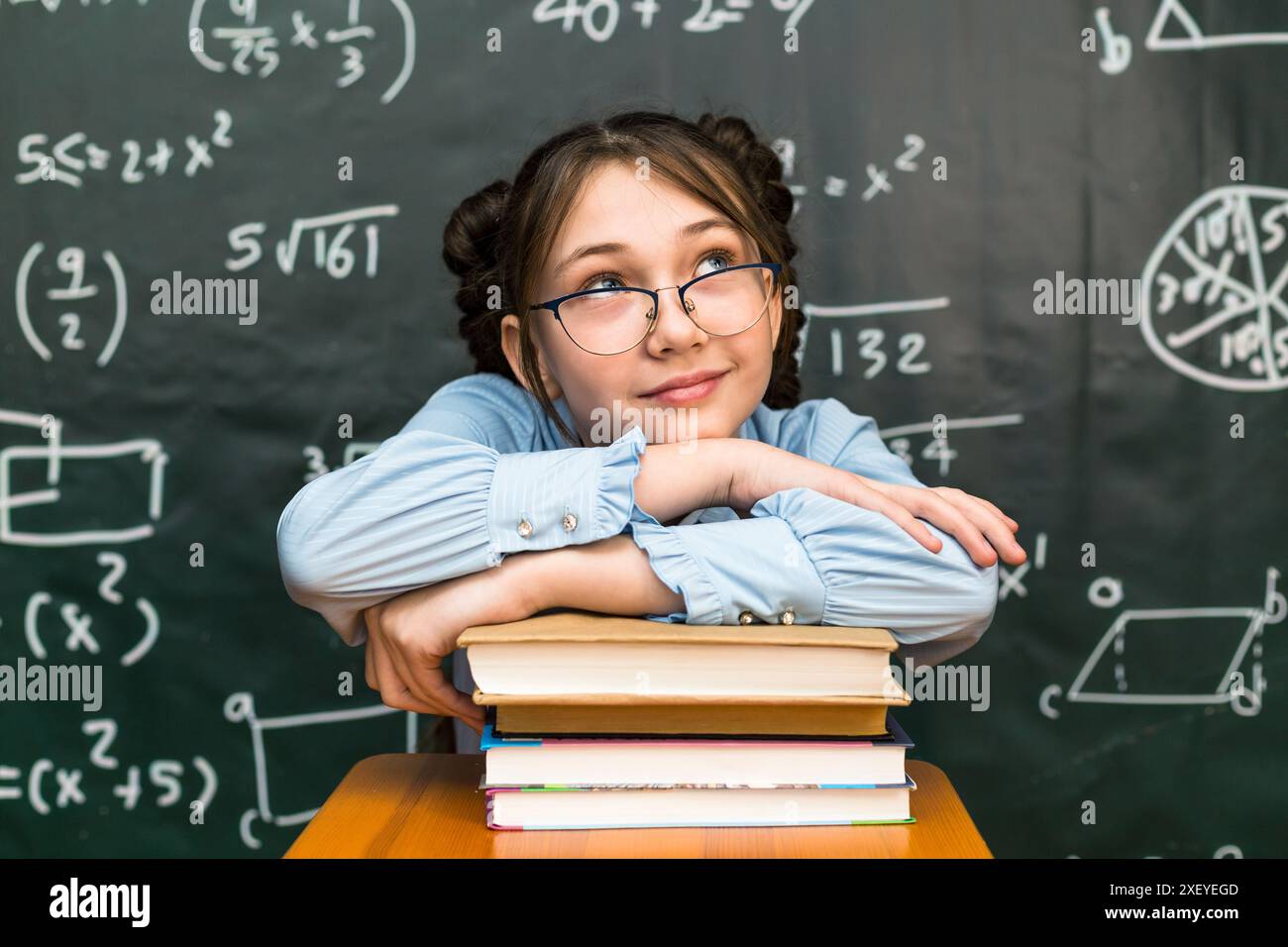 School girl sitting stack hi-res stock photography and images - Alamy
