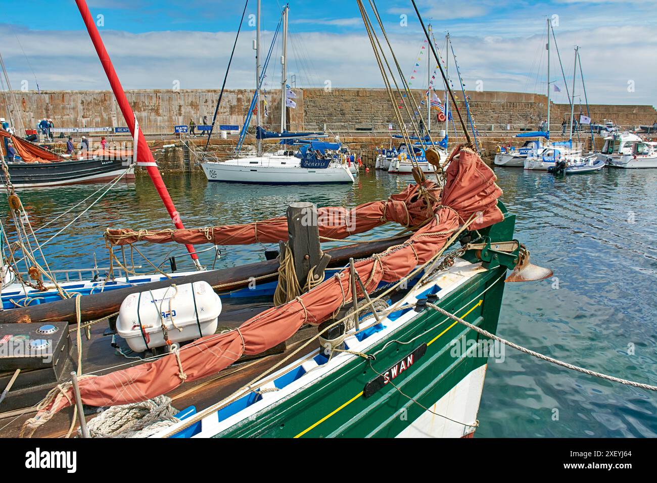 Portsoy Boat Festival boats in the harbour the green prow of the Swan ...
