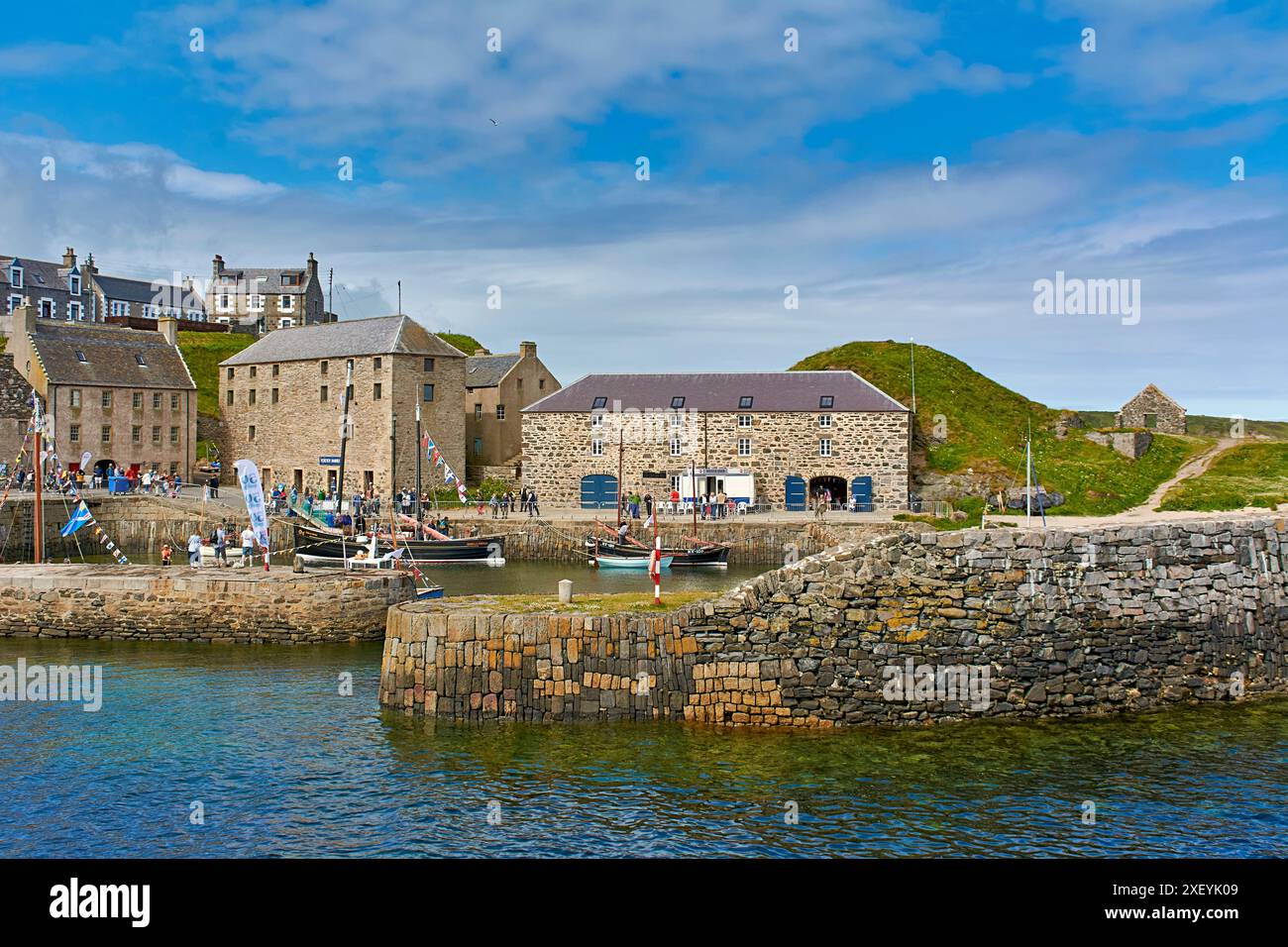 Portsoy Boat Festival the old harbour stone walls and moored boats ...
