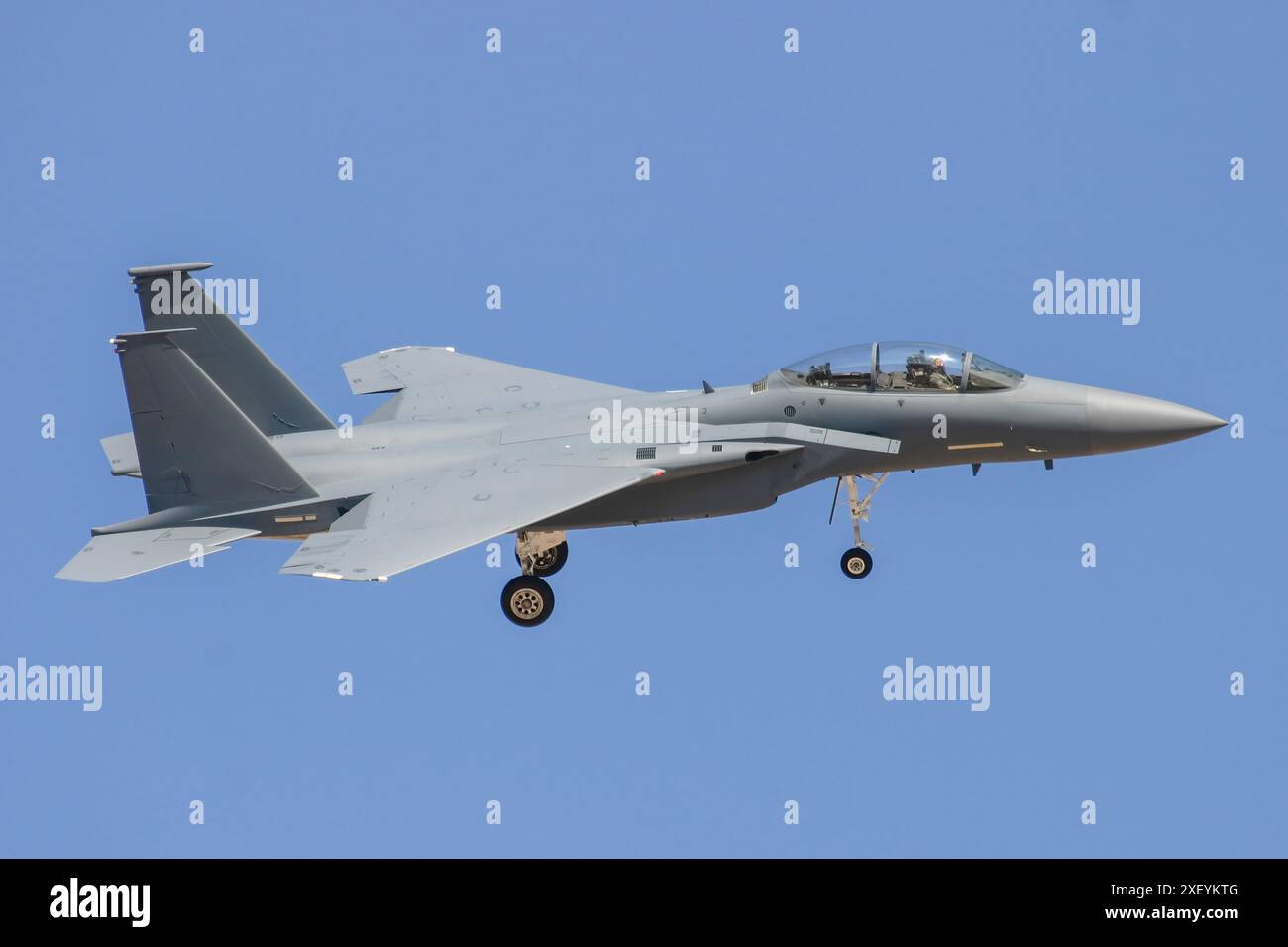 F15 Fighter Jet in Flight. Action photograph of Fast Jet military aeroplane on a combat mission ...