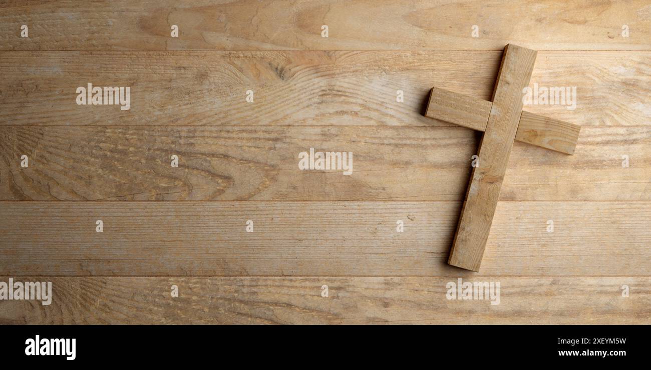 Wooden Jesus Christ christian crucifix or cross on wood table ...